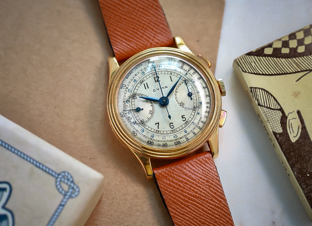 Cyma Multi-Scale Chronograph in Yellow Gold – Hairspring